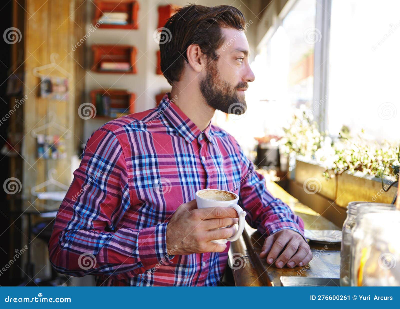 Always Start the Day with a Refreshing Cup of Coffee. a Young Man ...