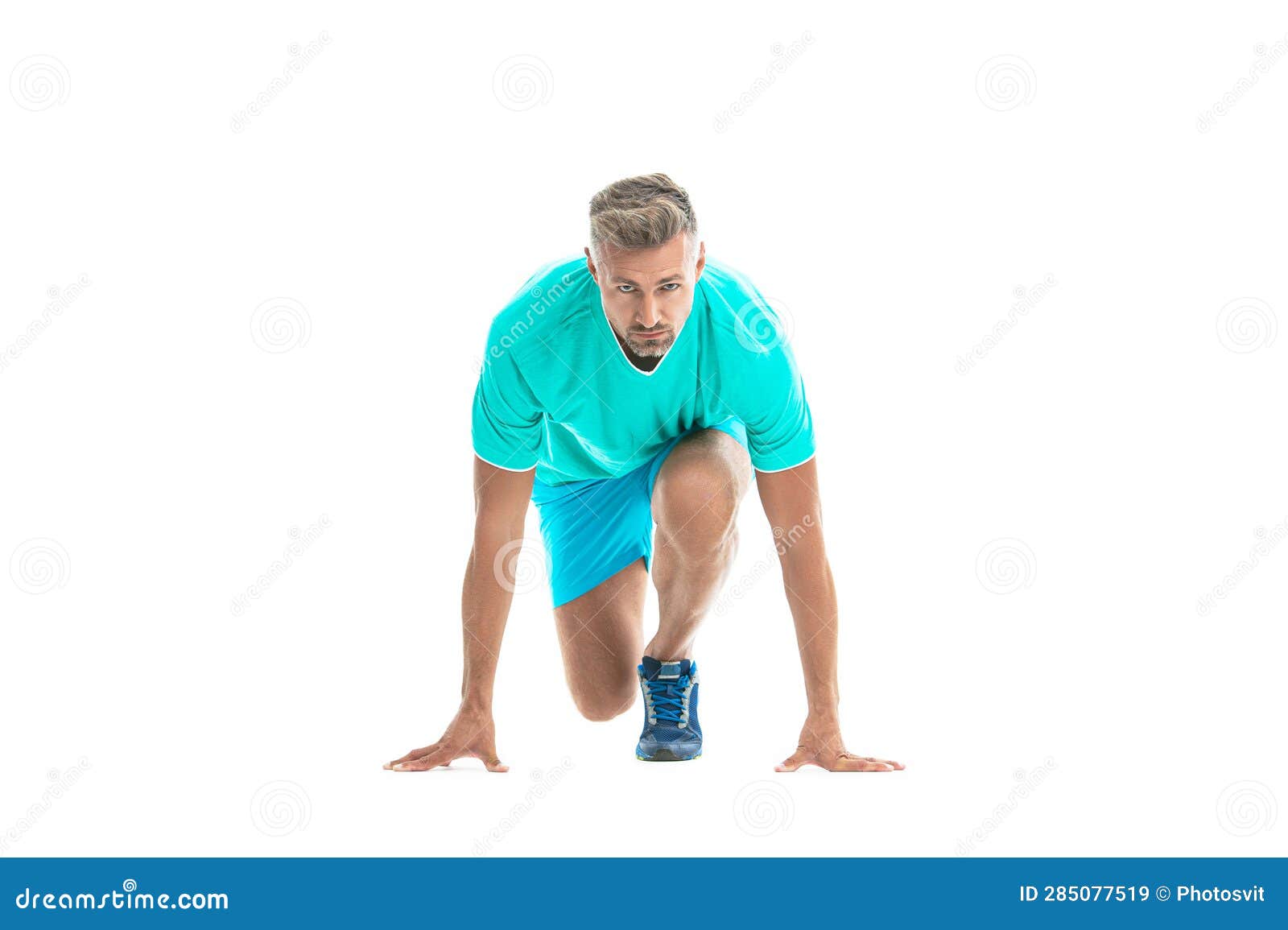 At the Start Line Runner Ready for Racing. Runner Getting Ready To ...