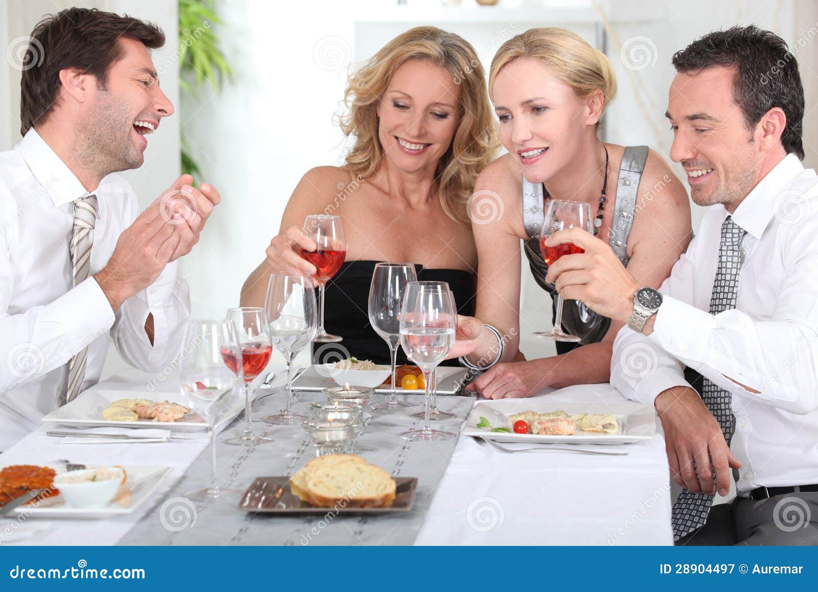 Start of a posh dinner. stock image. Image of black, alcohol - 28904497
