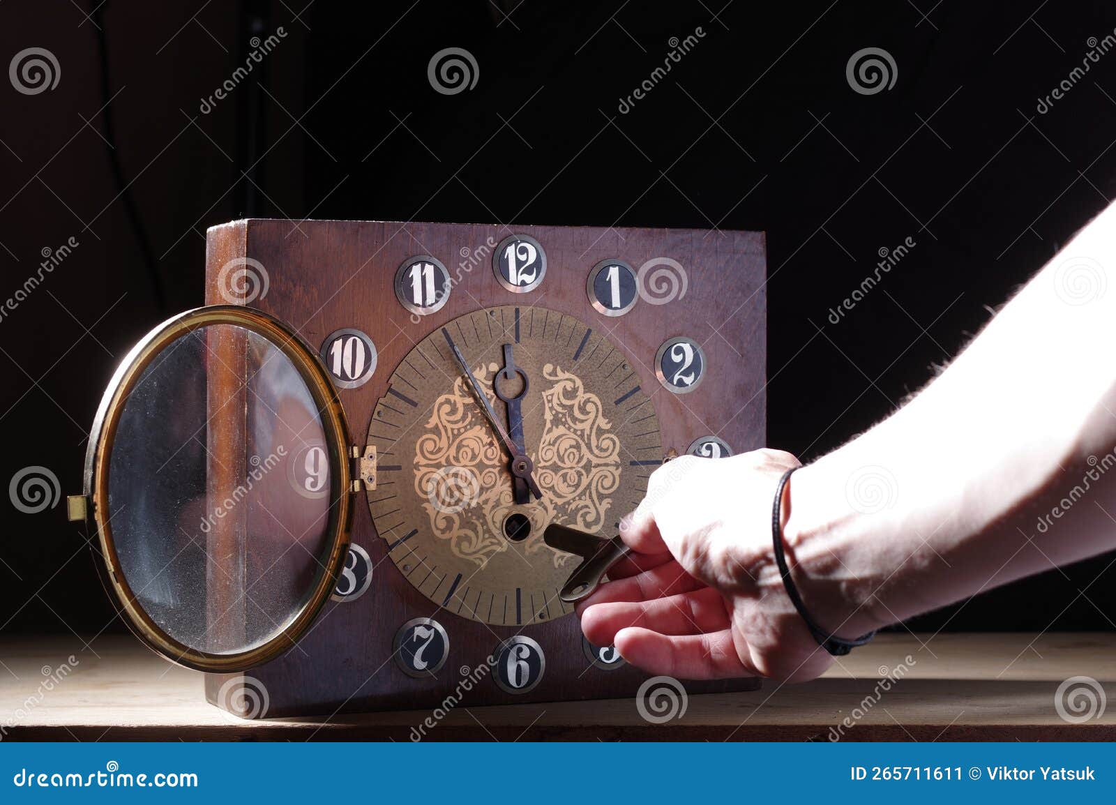 Start Time with a Key. Clockwork Key in Hand. Make Time Stock Image ...