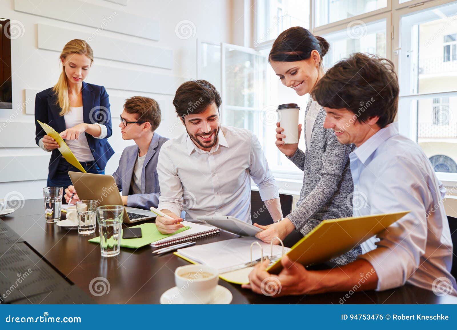 Start-up Team Discussing and Cooperating Stock Photo - Image of ...