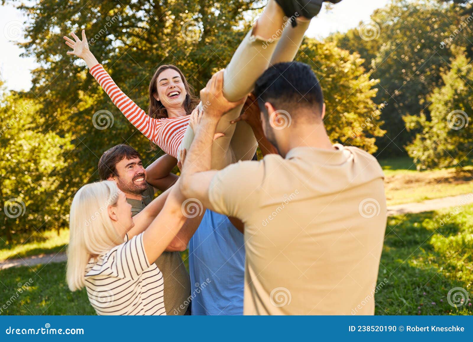 Start-up Team People Let a Young Woman Float Stock Photo - Image of ...