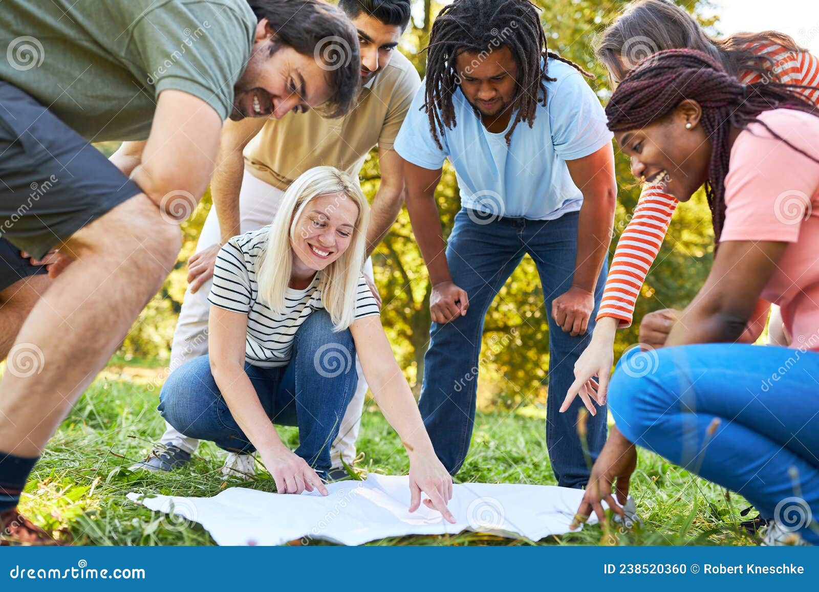 Start-up Team People Look at Map during Treasure Hunt Stock Photo ...