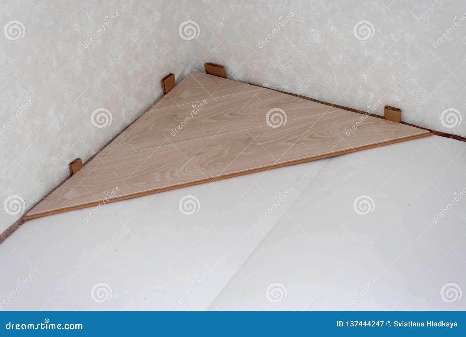 Start of Work from the Corner of the Room for Laying Laminate Stock ...