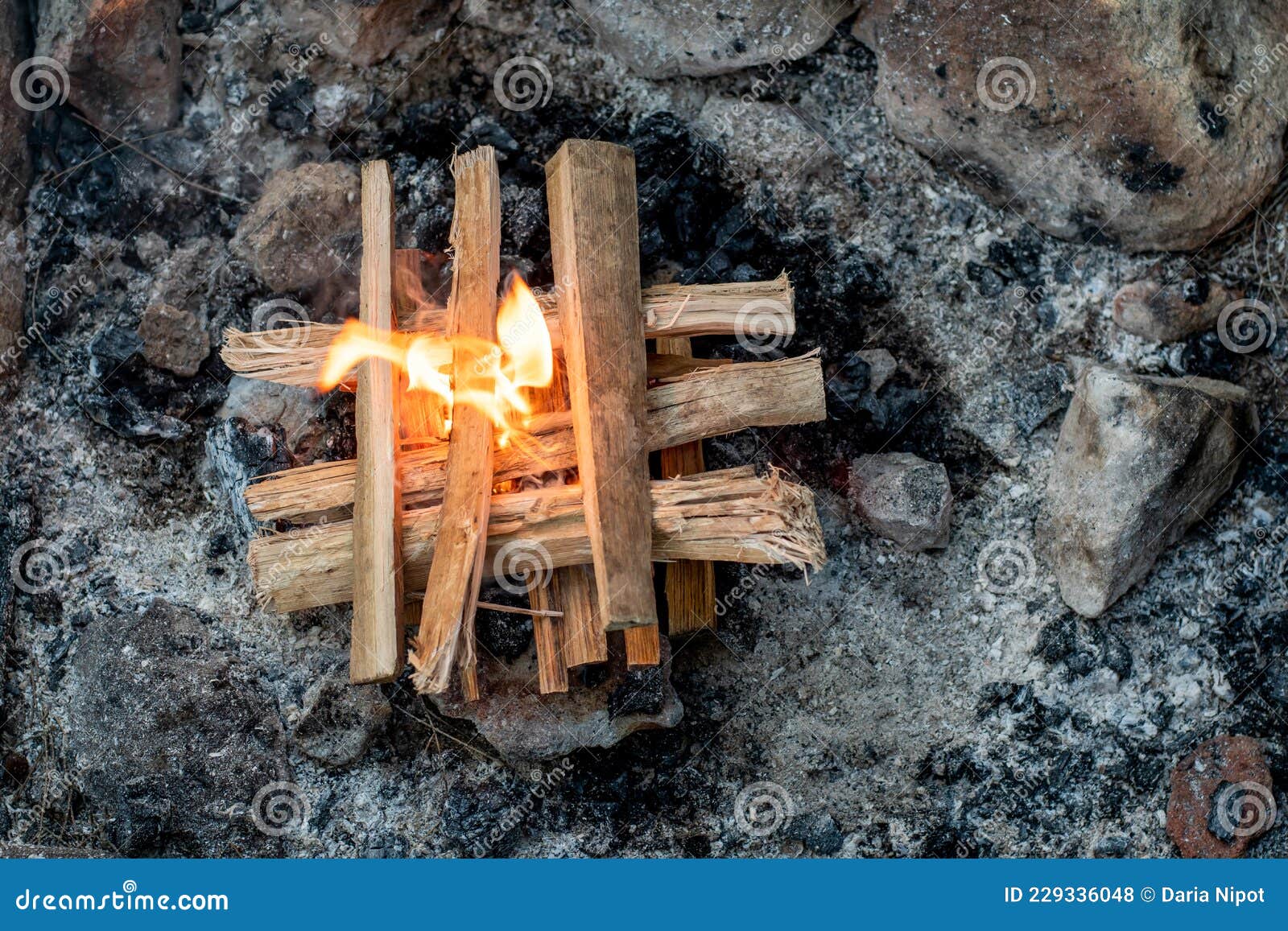 Starting the Camp Fire with Kindling. Camping Life Stock Photo - Image ...