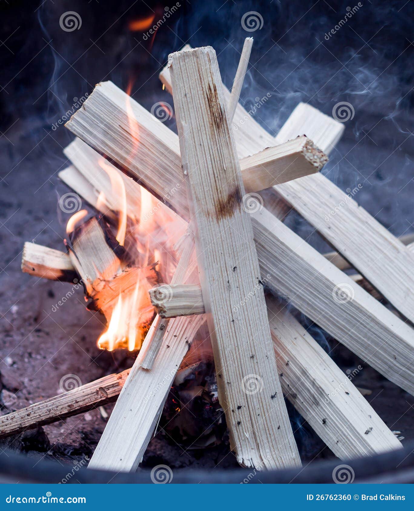 Starting a fire stock photo. Image of ignite, firepit - 26762360