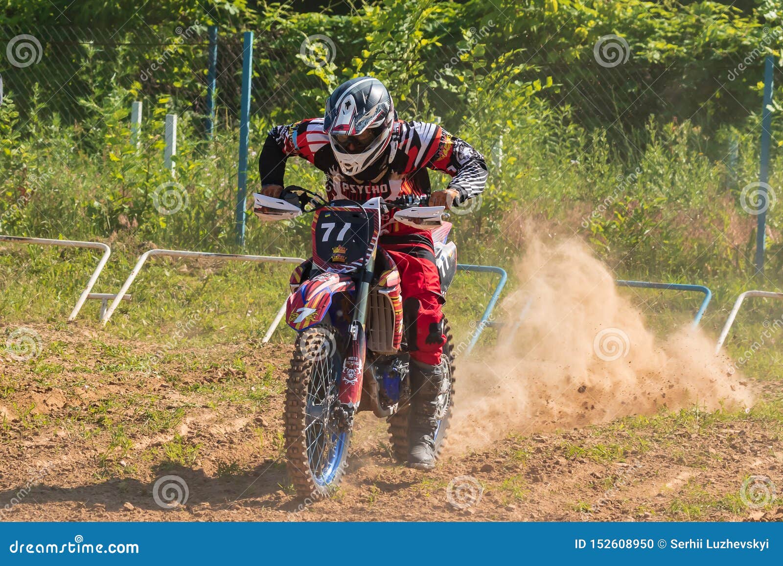 Starting Line in Motocross Competitions. Thick Dust Rises Behind the ...