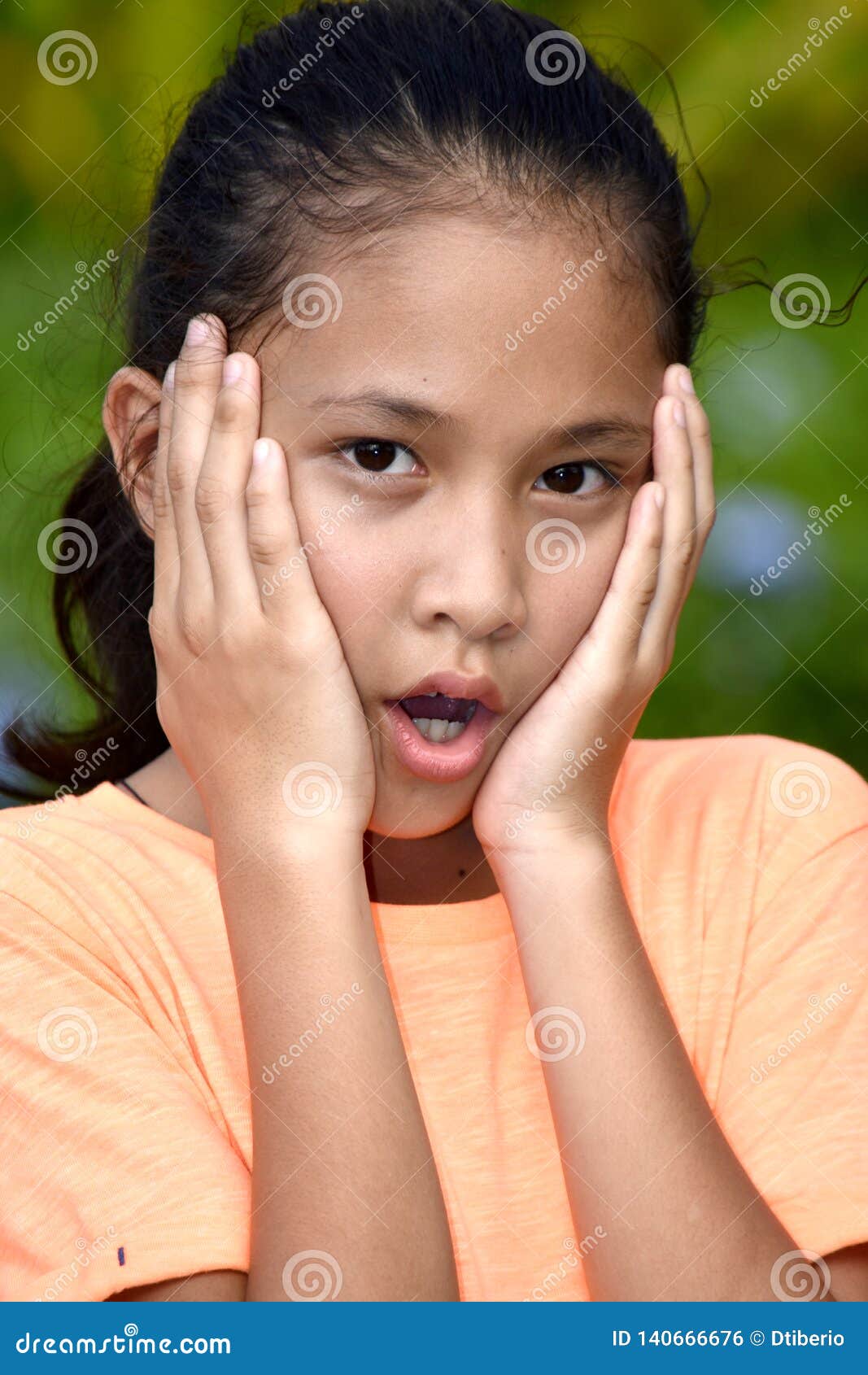 A Startled Girl Youth stock photo. Image of youth, youthful - 140666676