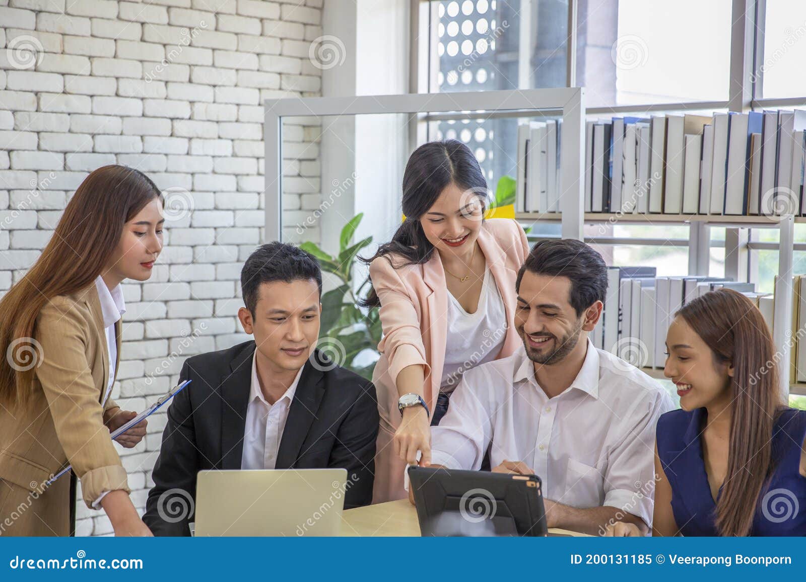 Startup Business Team on Meeting in Office and Discussing Documents and ...