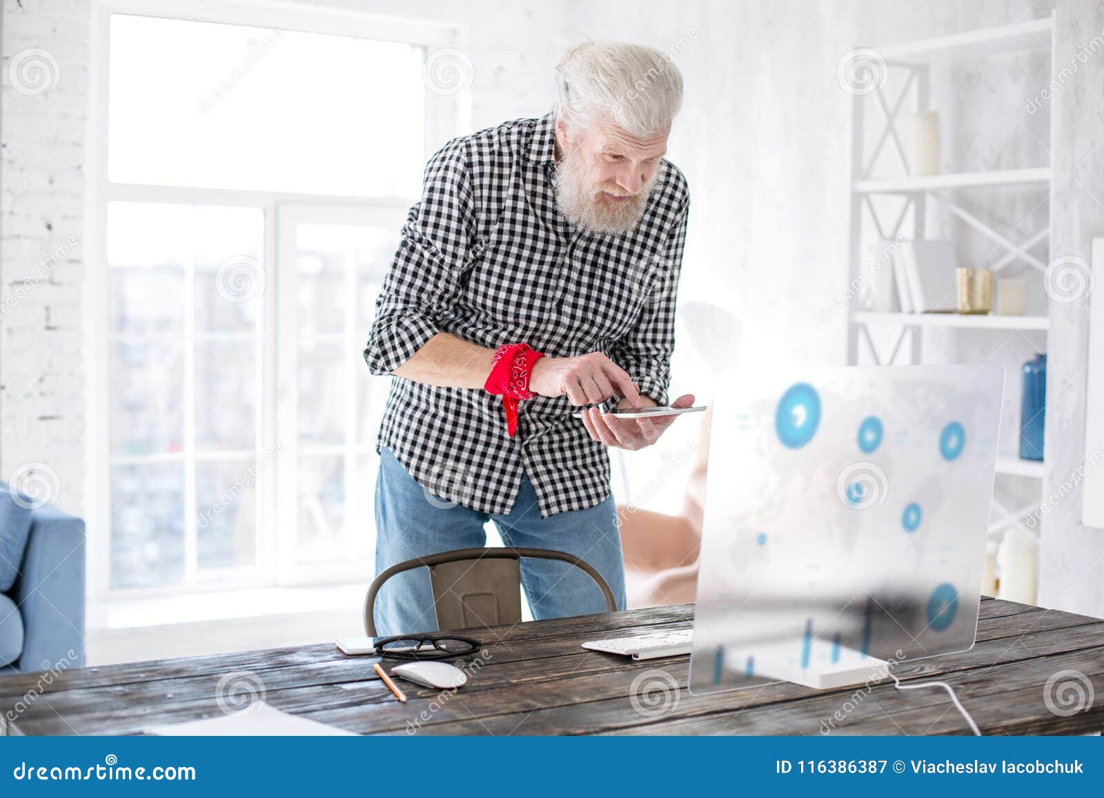 Charming Senior Man Projecting Data from Tablet Onto Screen Stock Image ...