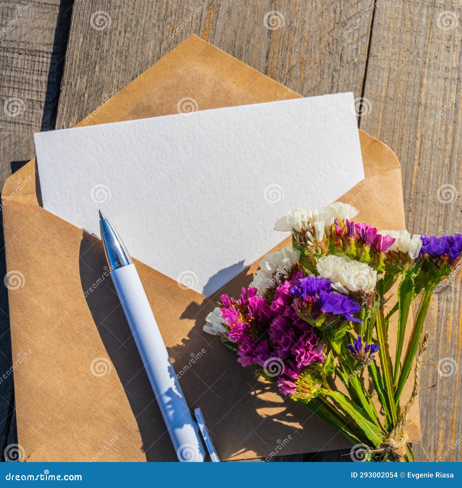 Static Flowers and an Envelope with an Empty Postcard. Stock Photo ...
