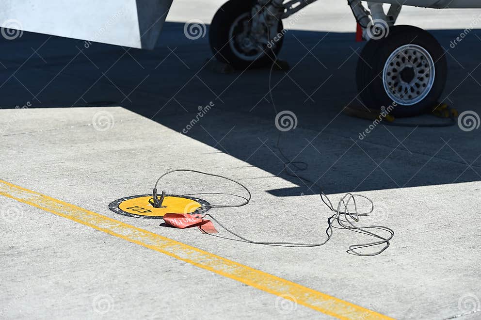 Static Grounding Clamps on Runway Stock Photo - Image of grounding ...