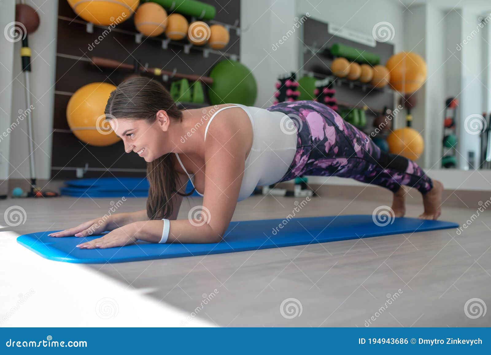 Woman Standing in a Plank Pose during the Training Stock Photo - Image ...