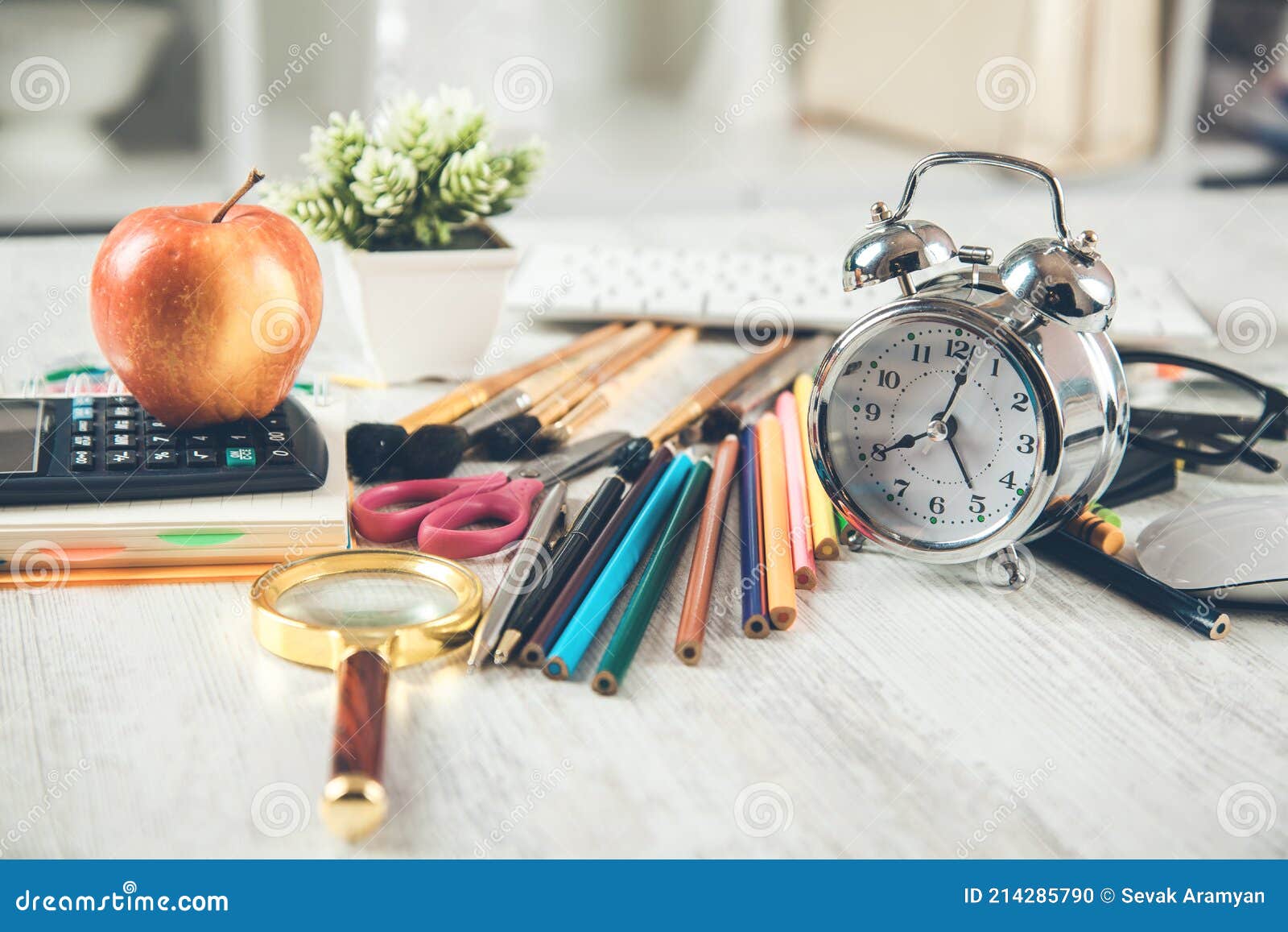 Stationary with Clock and Apple on Desk. Stock Photo - Image of apple ...
