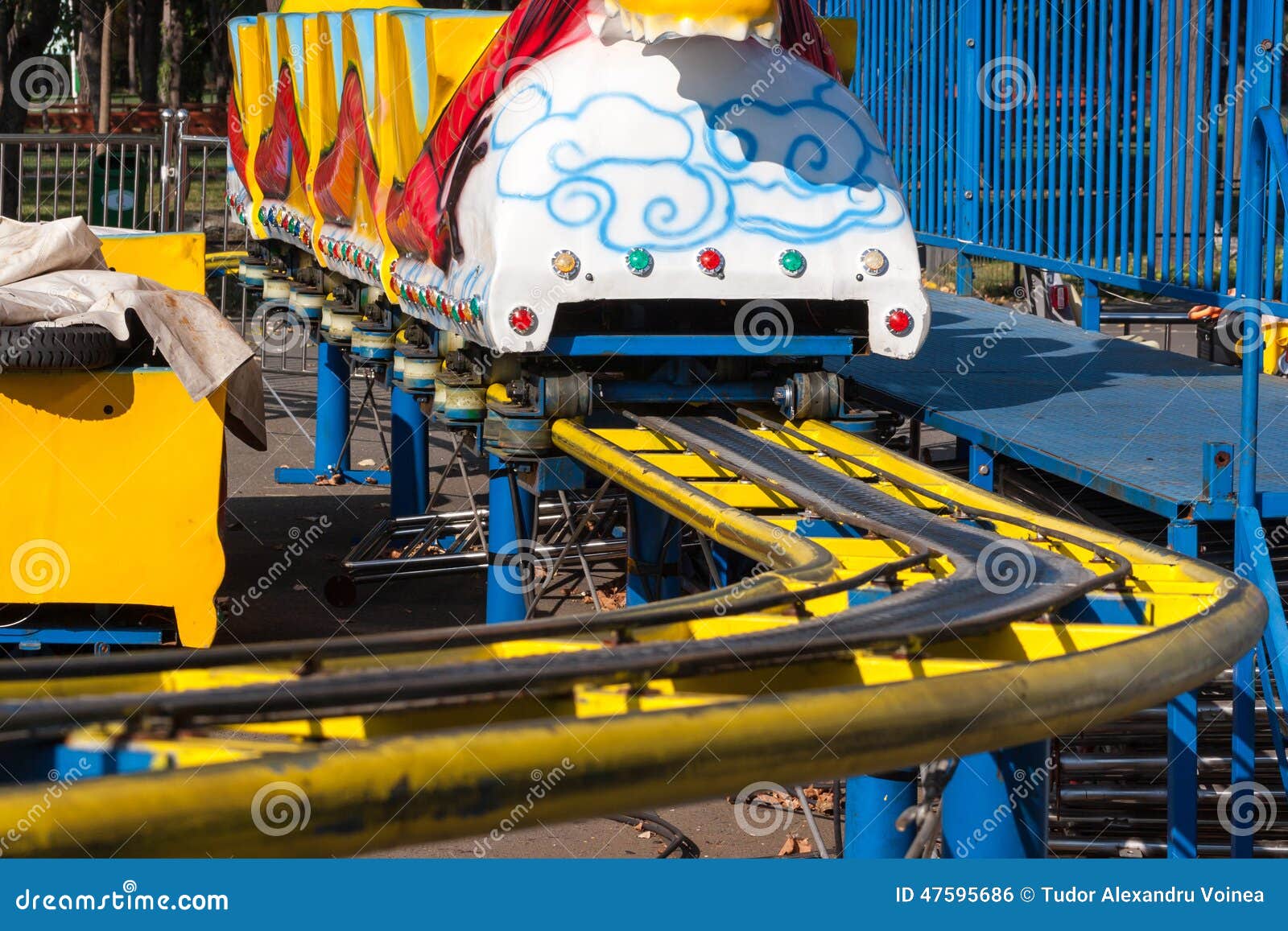 Stationary Kids Roller Coaster with Yellow Rails. Stock Photo - Image ...