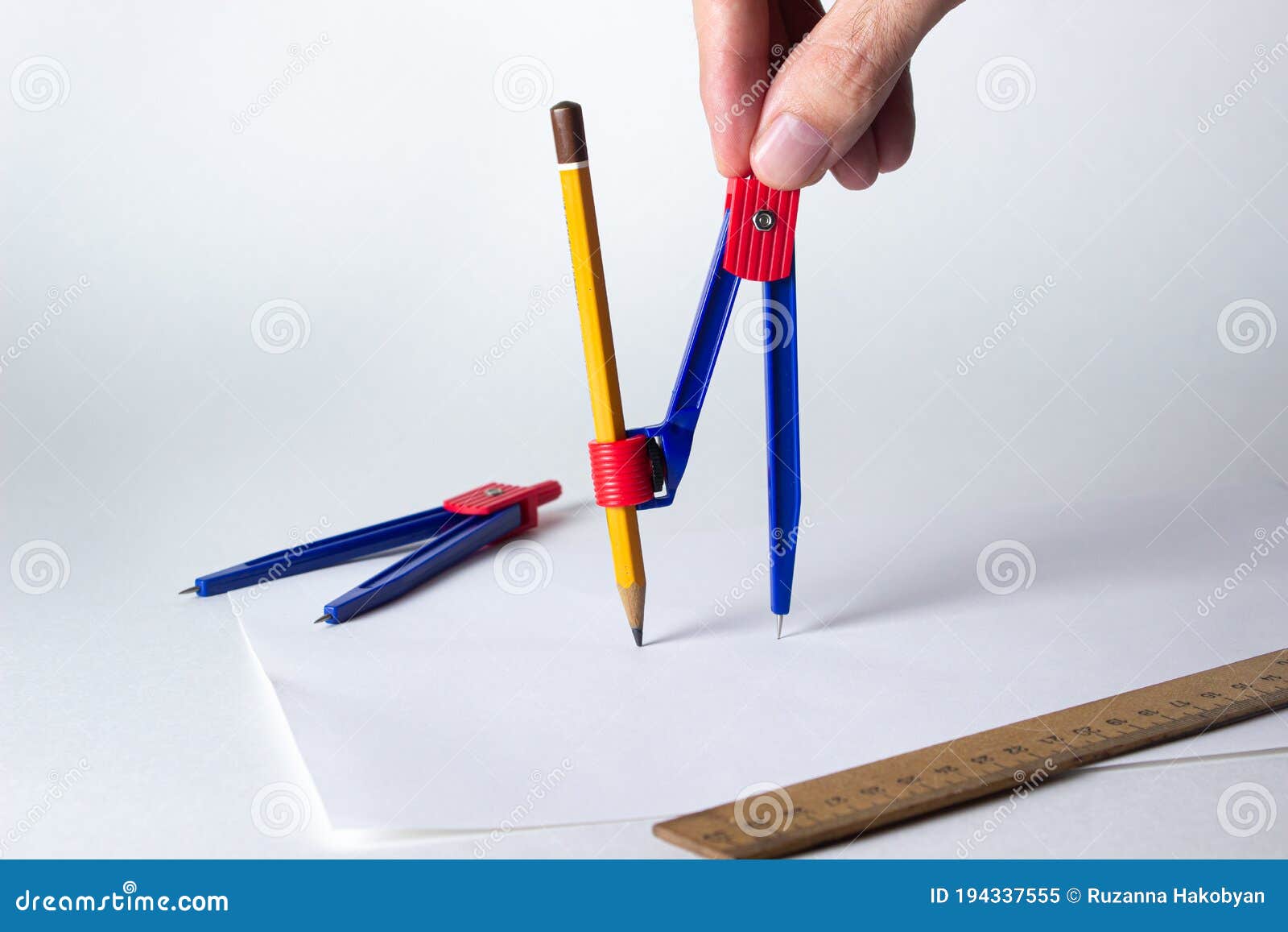 Stationery. Compasses on White Paper Stock Image - Image of engineering ...