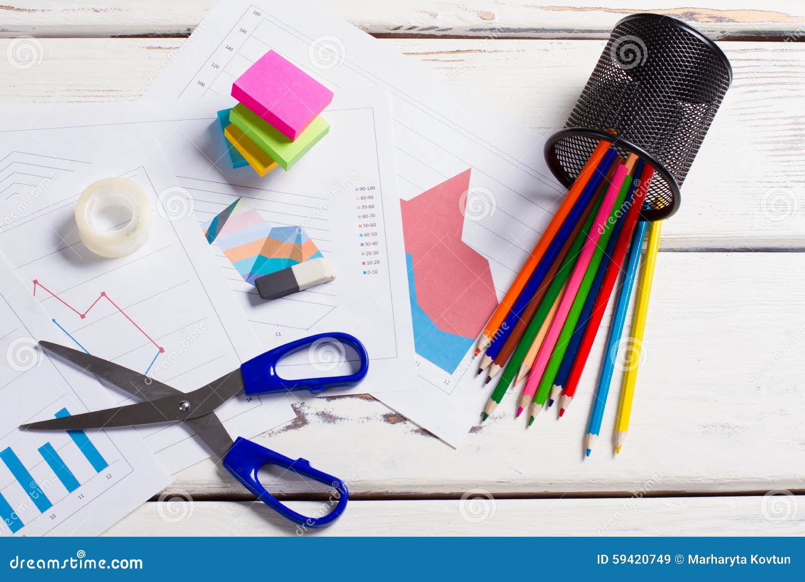 Stationery with Graphs on a White Wooden Table. Stock Image - Image of ...