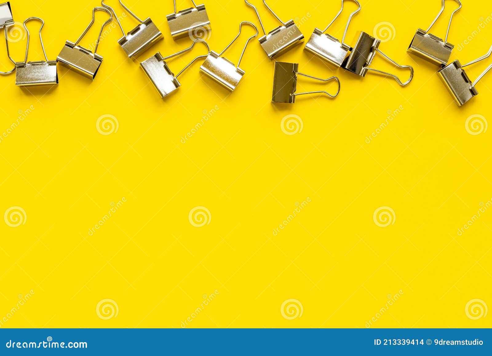 Stationery and Office Supplies Background. Paper Binder Clips Top View ...