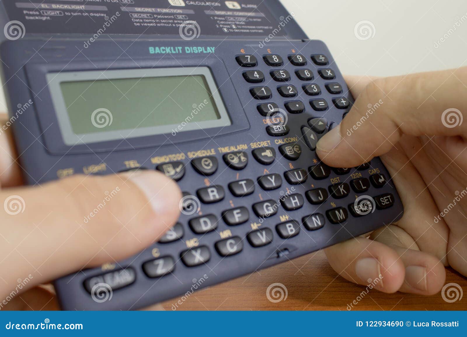 Stationery, Student is Doing Math Using a Calculator Stock Photo ...