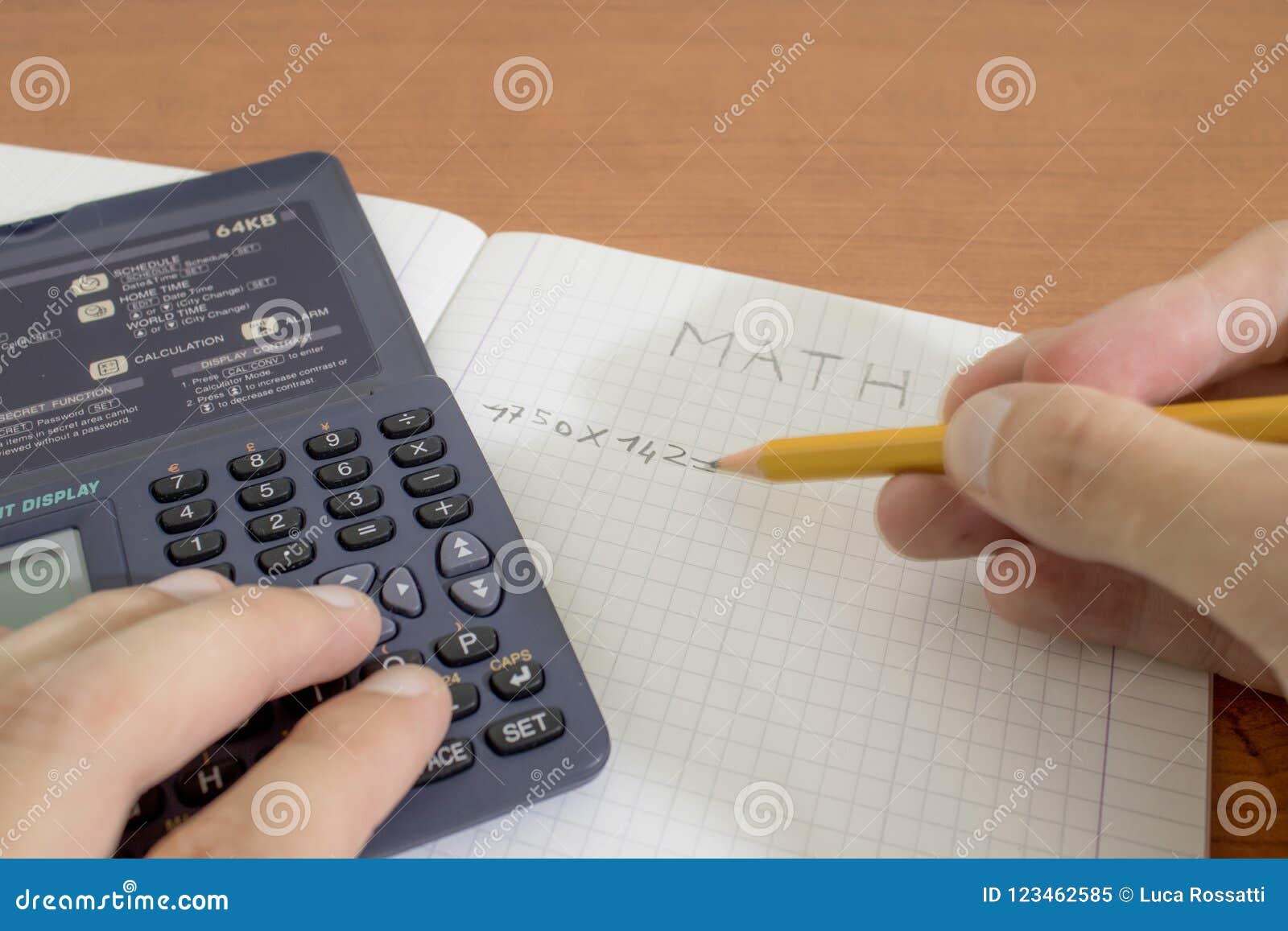 Stationery, Student is Doing Math Using a Calculator Stock Image ...