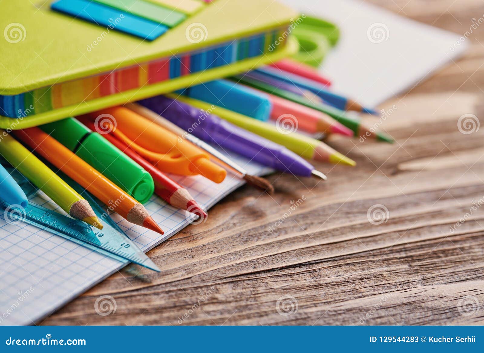 Stationery Under a Bright Notebook on the Table Stock Image - Image of ...