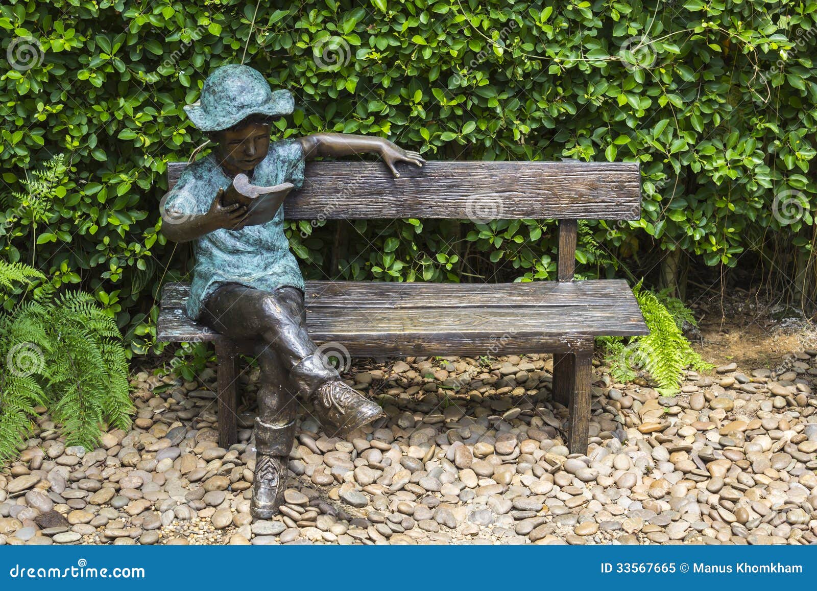 Statue on bench stock image. Image of chair, design, scene - 33567665