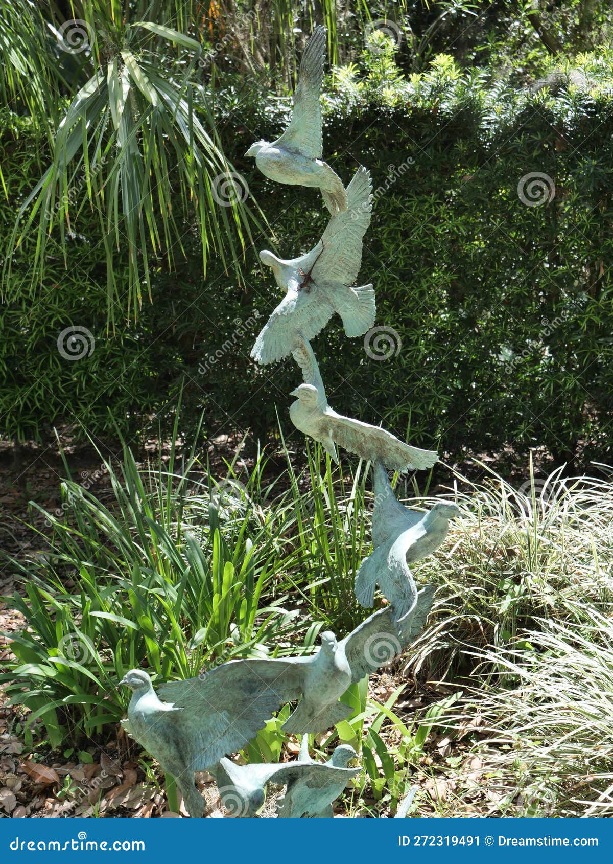 Statue of birds in a park stock image. Image of birds - 272319491