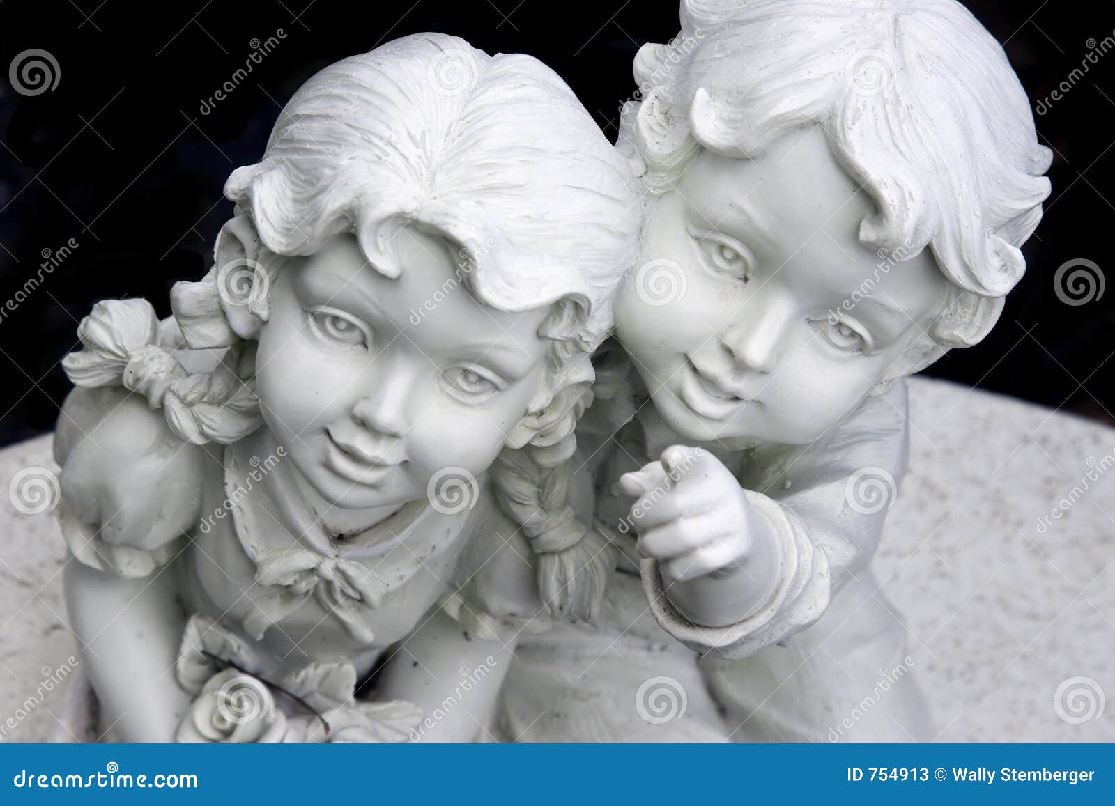 Statue of boy and girl stock image. Image of watch, couple - 754913