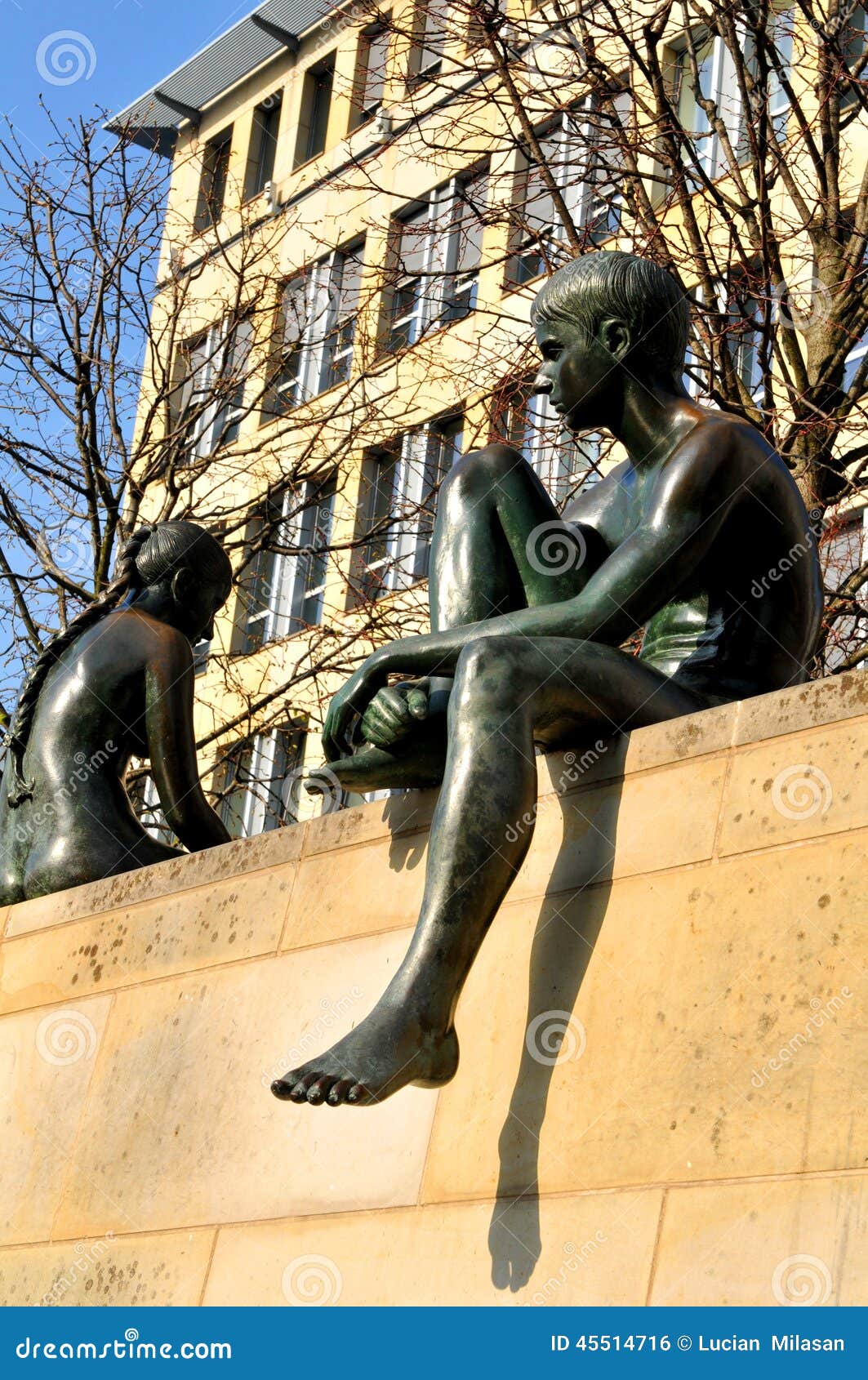 Statue of boy and girl stock photo. Image of architectural - 45514716