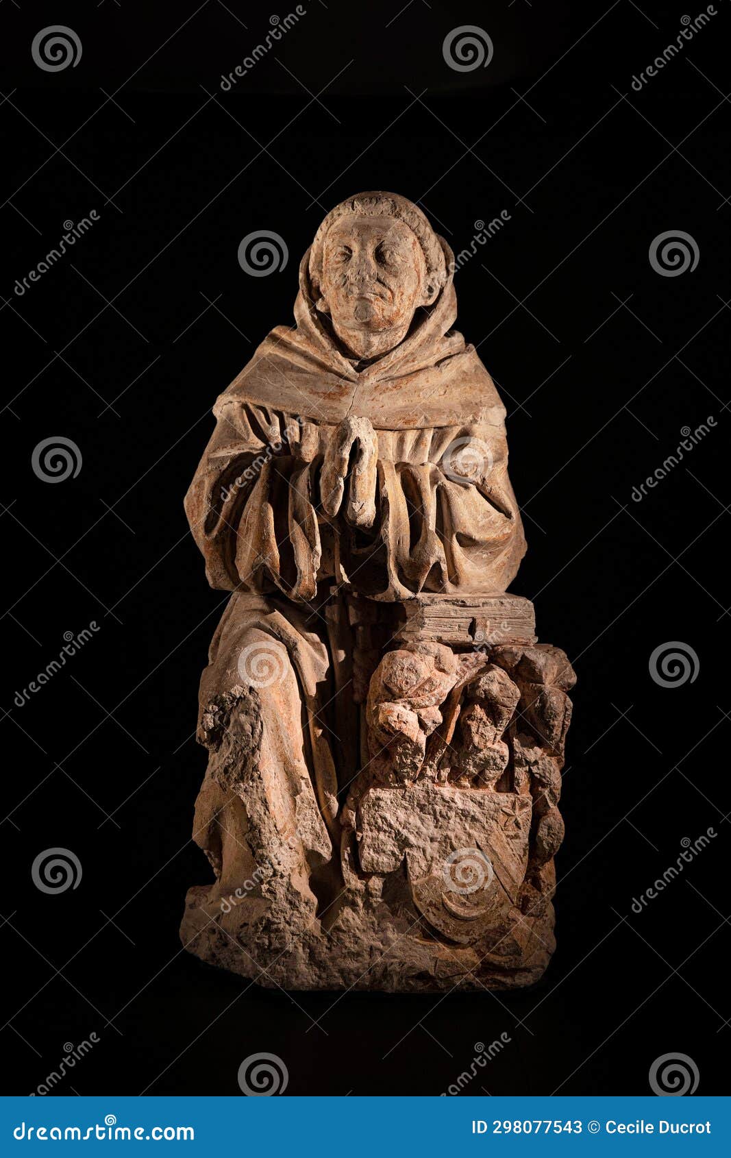 Statue of a Catholic monk stock image. Image of prayer - 298077543