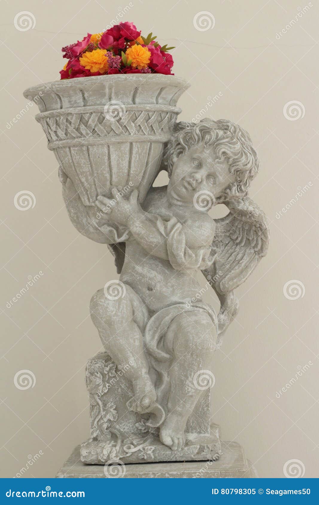 Statue of Cupid in Garden with Flower. Stock Image - Image of ...