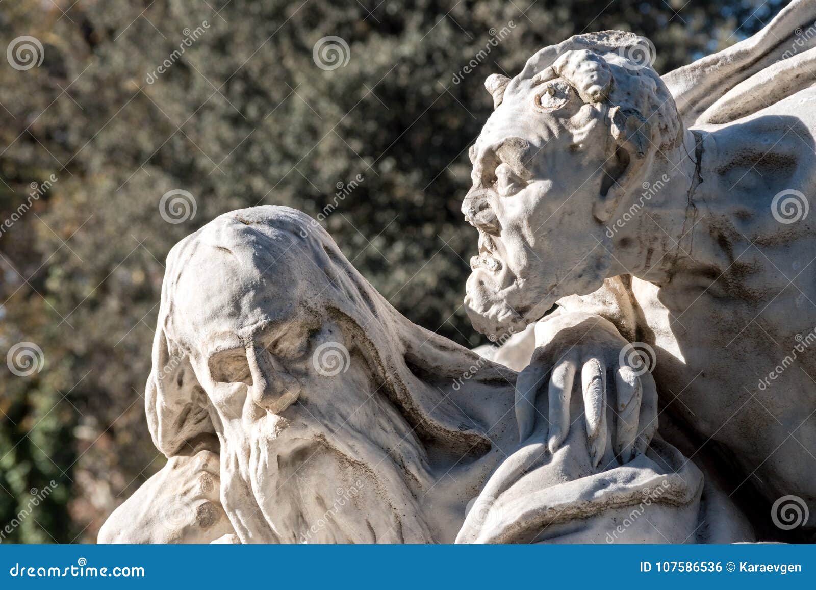 Statue of the Devil Talking To a Man. Stock Photo - Image of horror ...