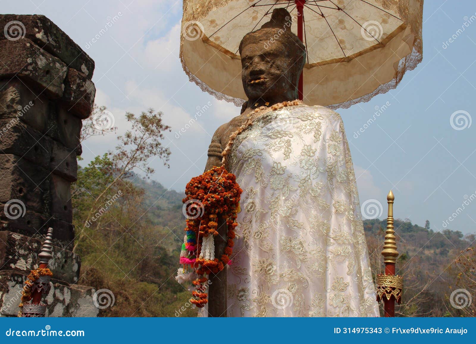 Statue of a Divinity in a Ruined Khmer Hindu Temple Complex (vat Phou ...