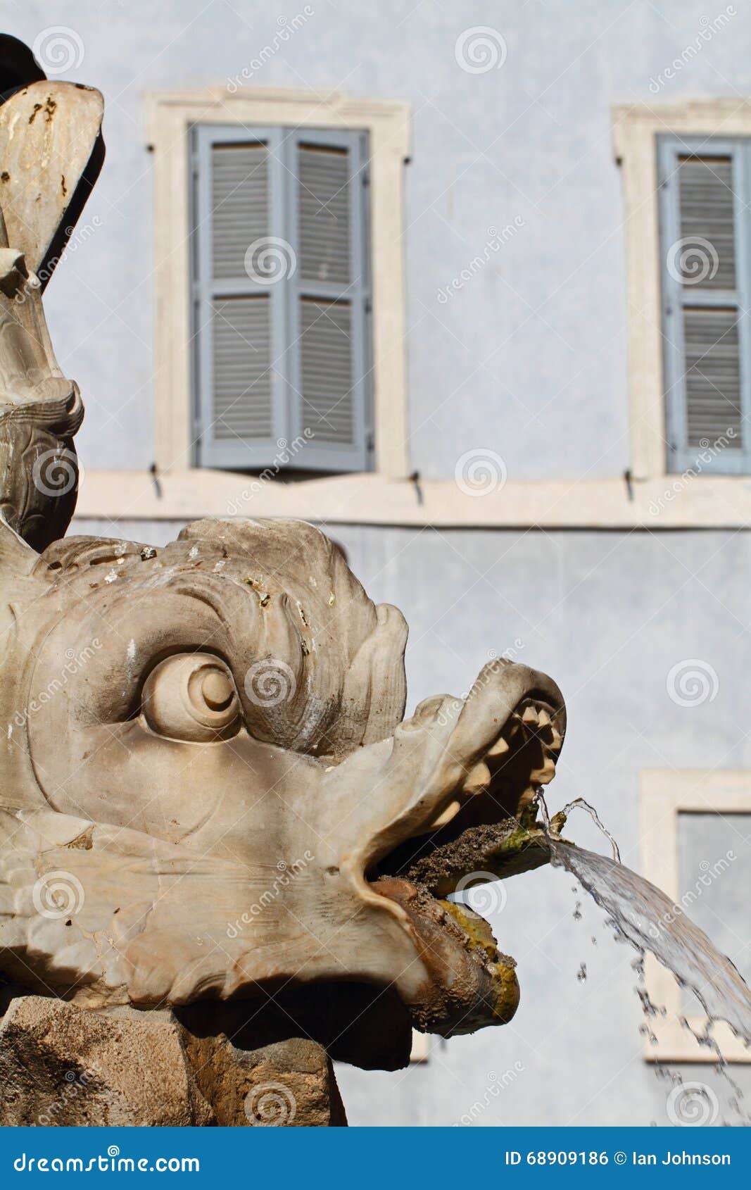 Statue of a Dolphin in Rome Stock Photo - Image of fountain, carving ...