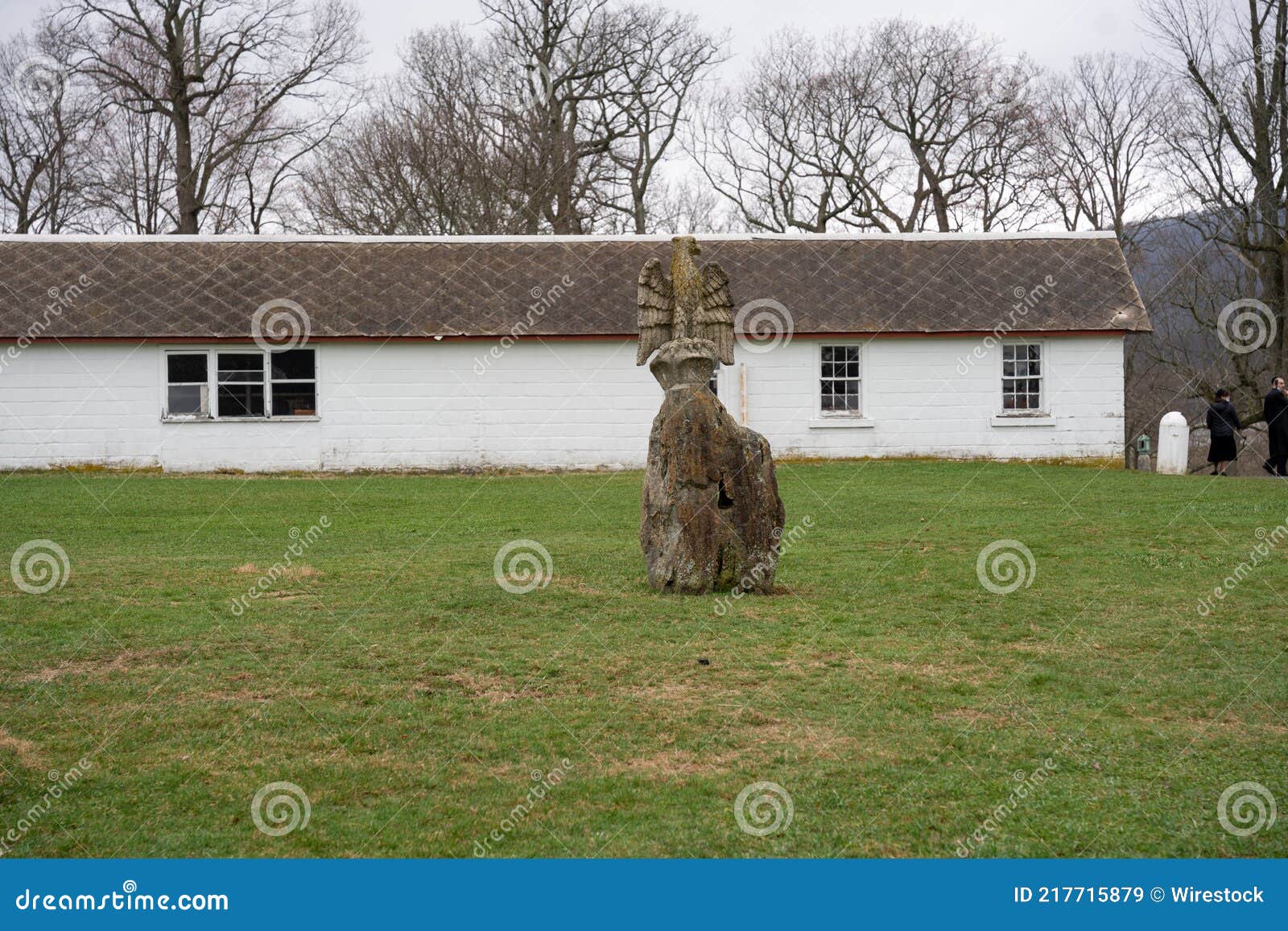 Statue Of An Eagle Standing On The Stone In The Rural House Background ...