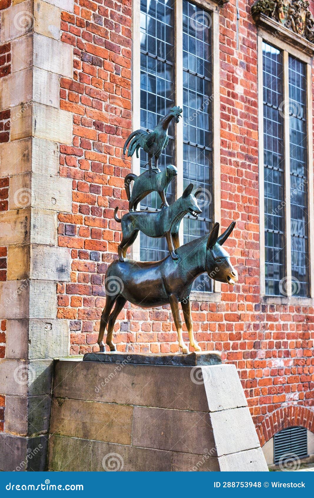 Statue of Farm Animals Near a Brick Building Stock Photo - Image of ...