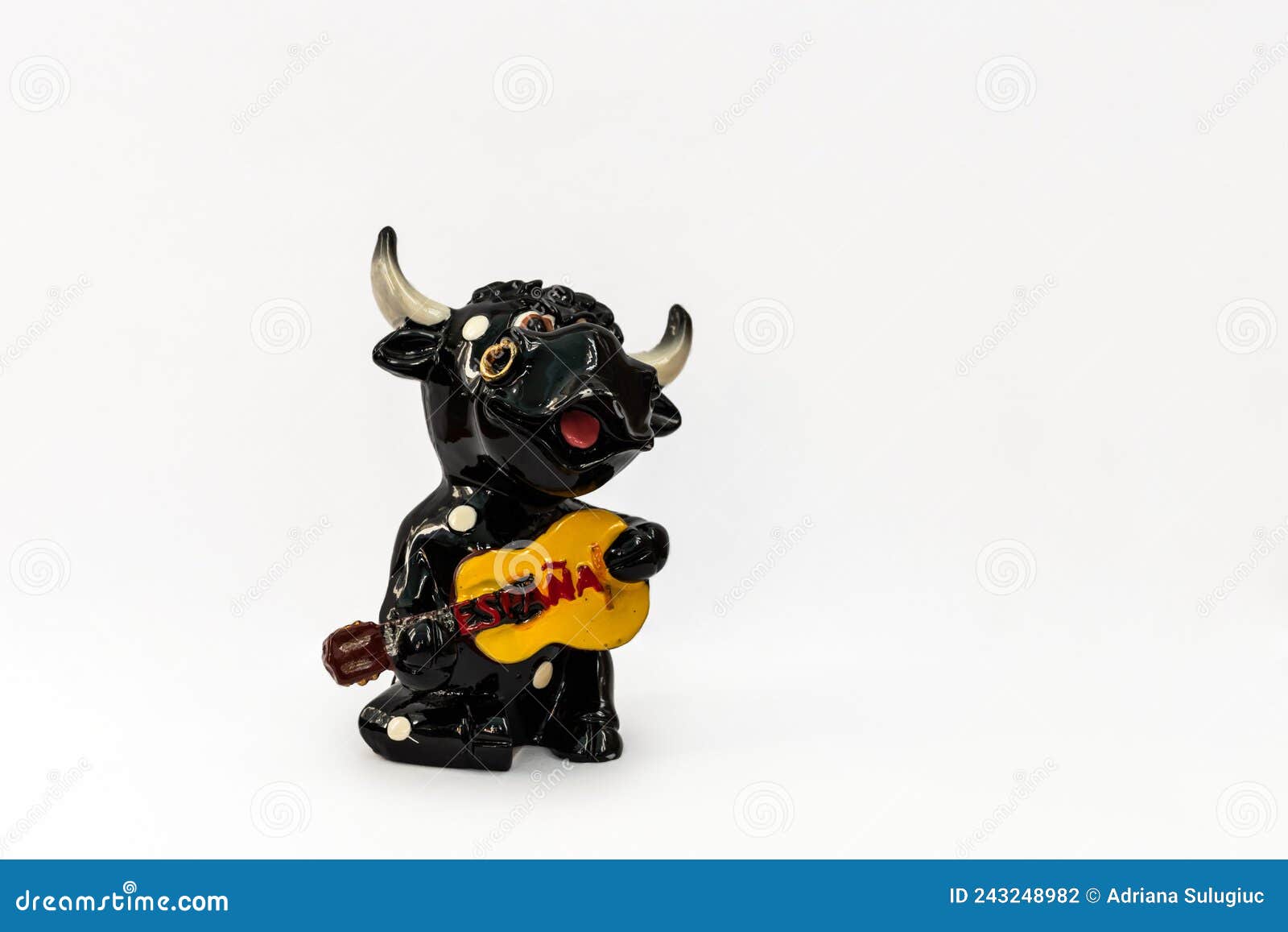 Statue of a Funny Cow Playing on the Guitar Stock Photo - Image of ...