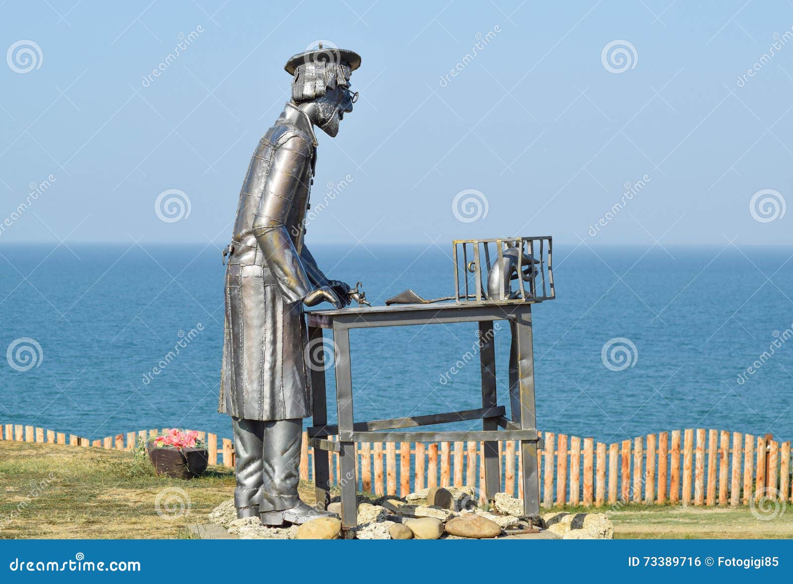 Statue of a Furrier from Metal with a Rat in a Cage Stock Photo - Image ...