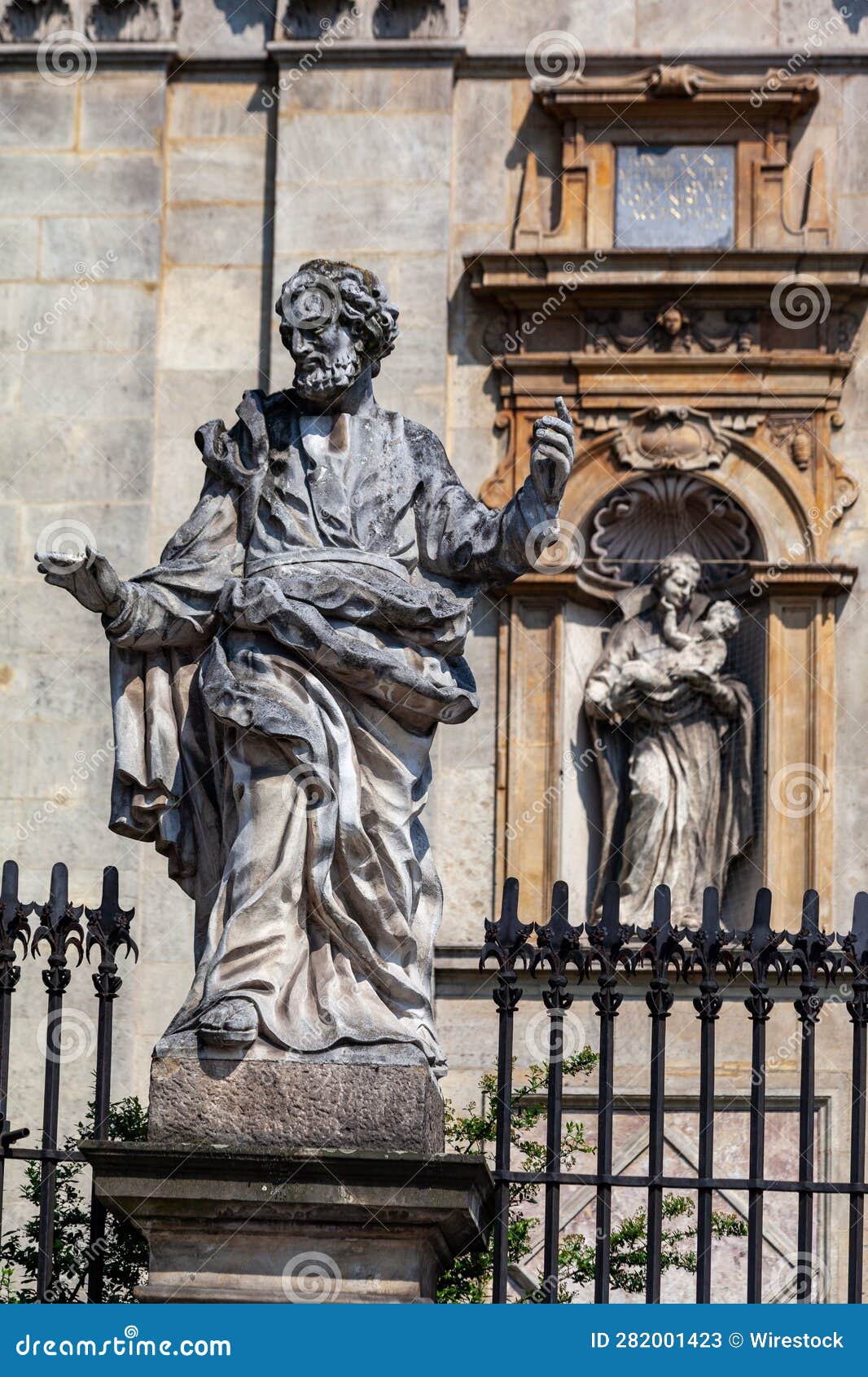 A Statue of the God and the Goddess in Front of the Building Stock ...