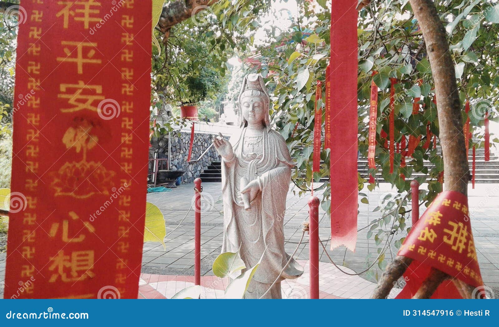 Statue of Goddess Kwan Im Under the Bodhi Tree. Stock Photo - Image of ...