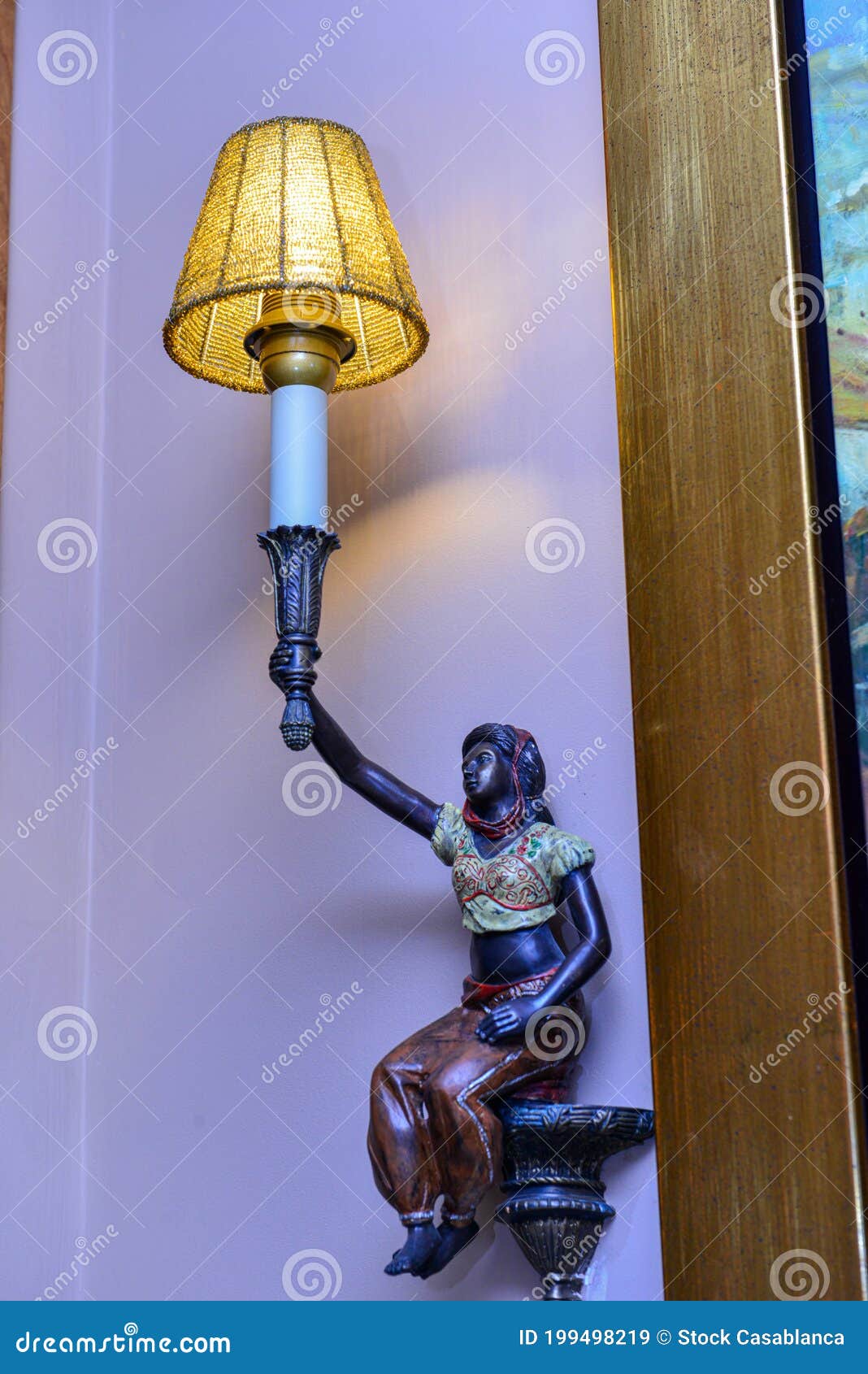 Statue Holding a Luminous Lamp. Old Antique Editorial Stock Image ...