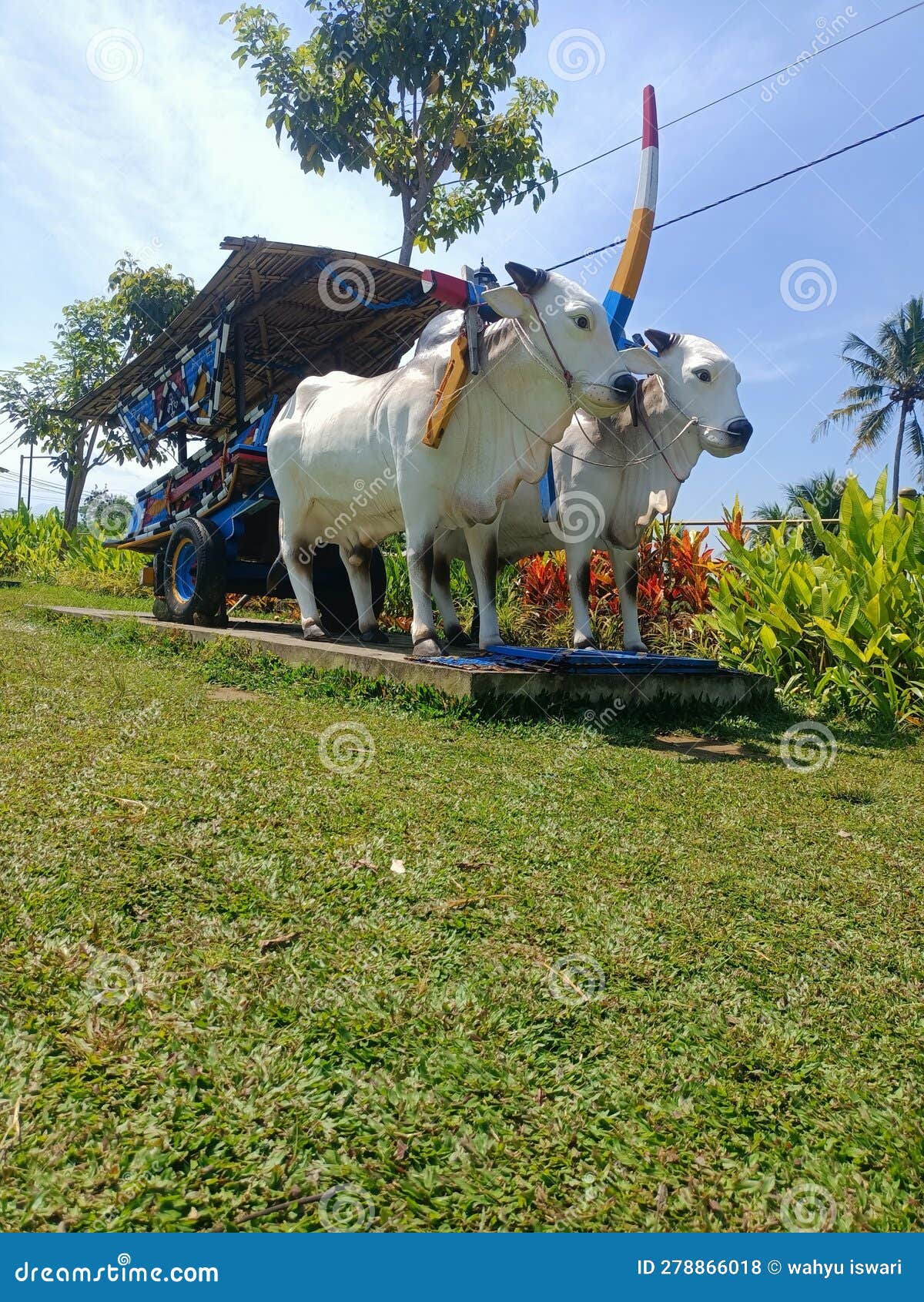 A Statue I.e. Two More Cows Carrying a Cart Behind Them Stock Photo ...