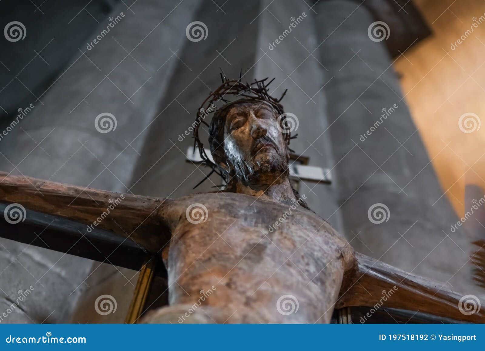 A Statue of Jesus Hanging from a Cross Stock Photo - Image of christ ...