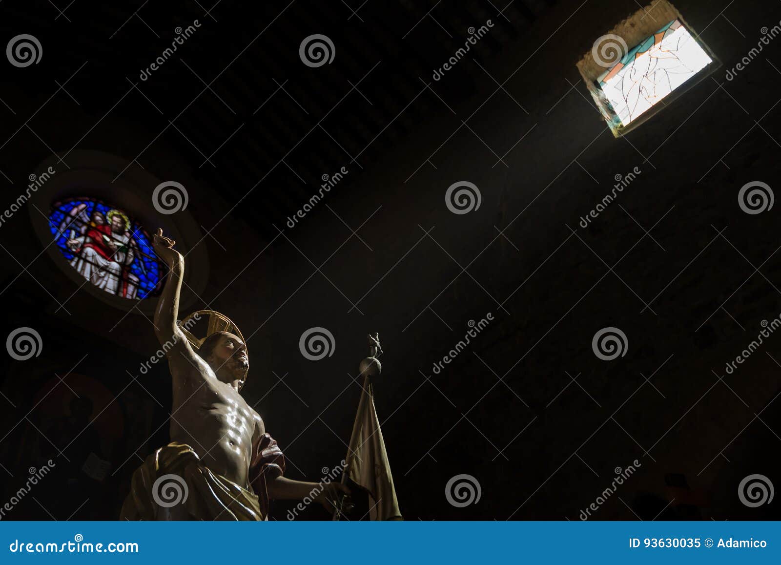 Statue of Jesus Illuminated by a Ray of Light Stock Image - Image of ...