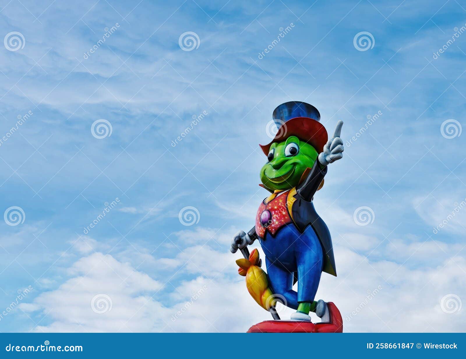 Statue of Jiminy Cricket Under a Cloudy Blue Sky. Editorial Photography ...