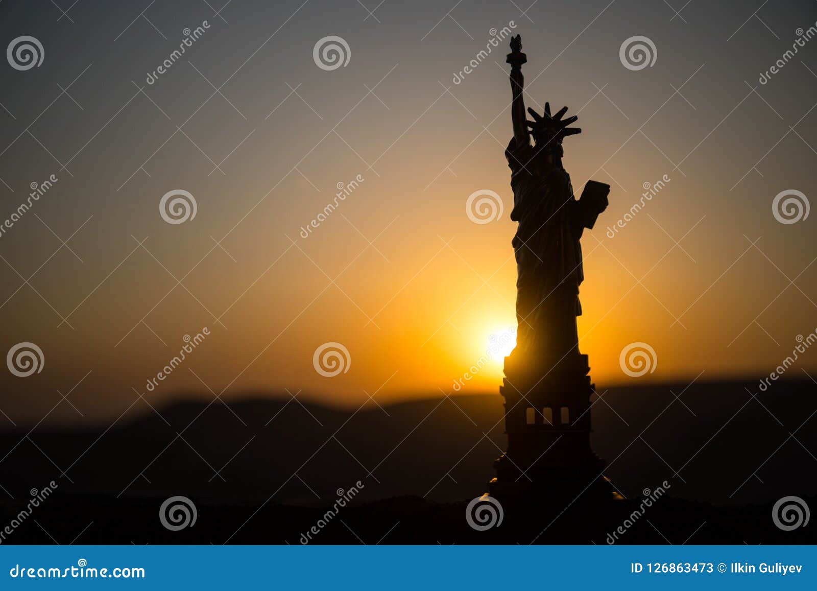Statue of Liberty on the Background of Colorful Dawn Sky Stock Image ...