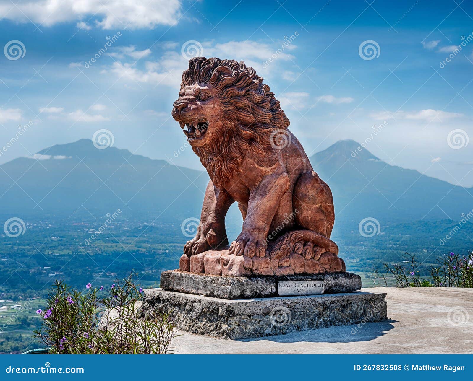 Stone Lion with Volcanoes stock photo. Image of statue - 267832508