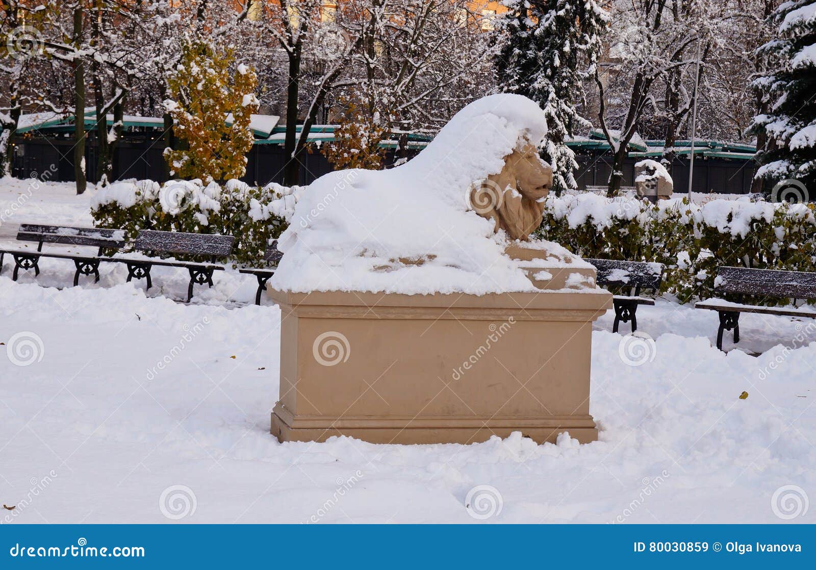 Statue of lion under snow stock image. Image of culture - 80030859