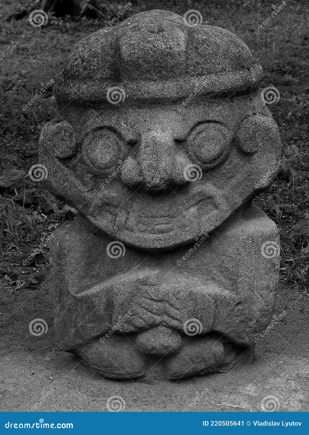 A Statue Made of Stone and with a Big Round Head Stock Image - Image of ...