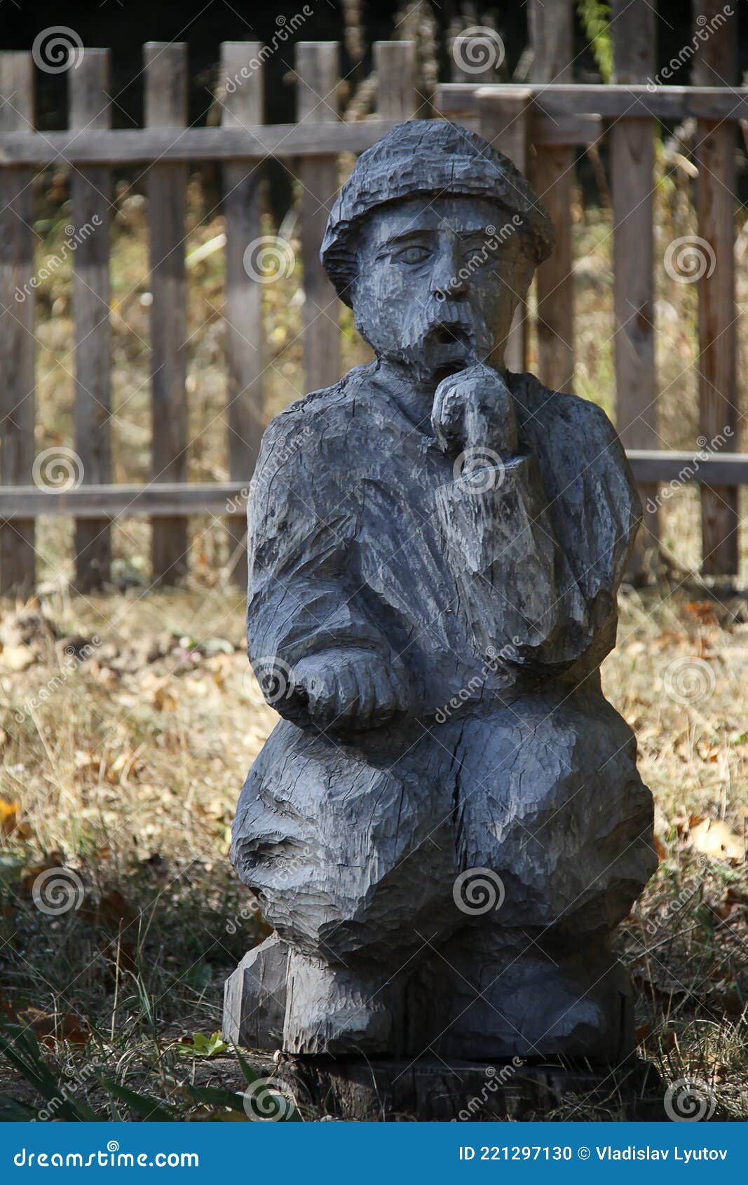 A Statue Made of Stone and with a Big Round Head Stock Photo - Image of ...